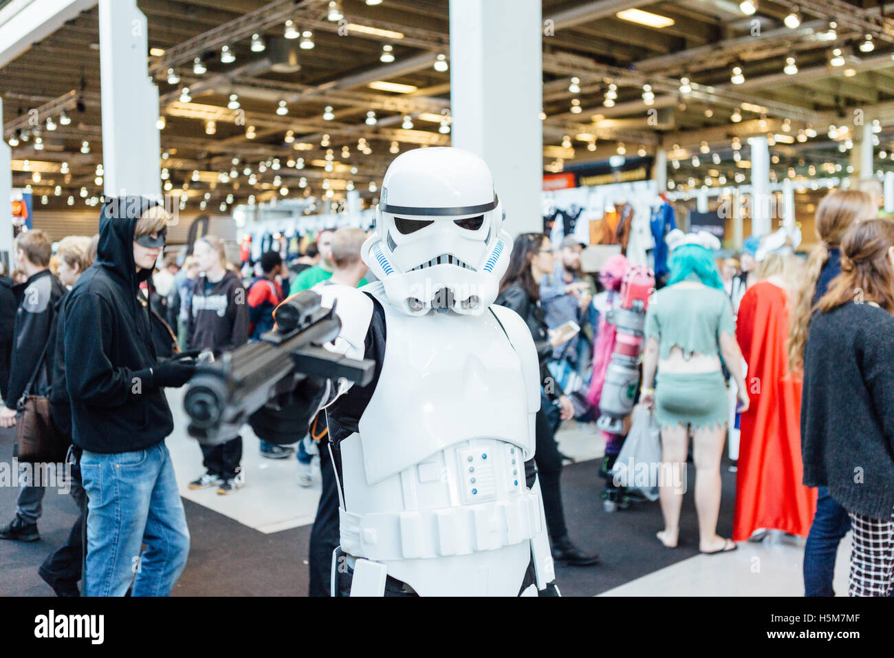 A cosplayer wears a Stormtrooper costume, known from the Star Wars ...