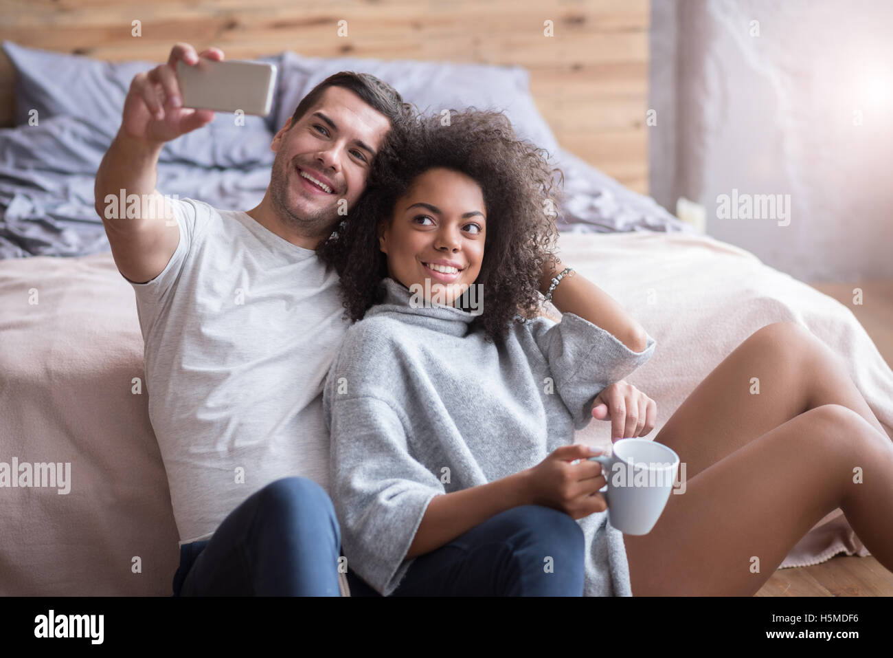 Young couple making love bed hi-res stock photography and images - Alamy