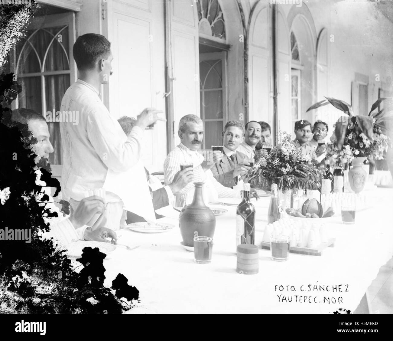 A historical image from the Mexican Revolution showing a man giving a ...