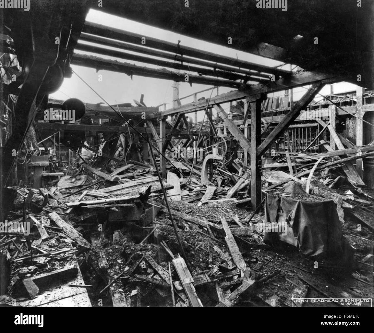 This black and white photograph captures bomb damage at Readhead's ...