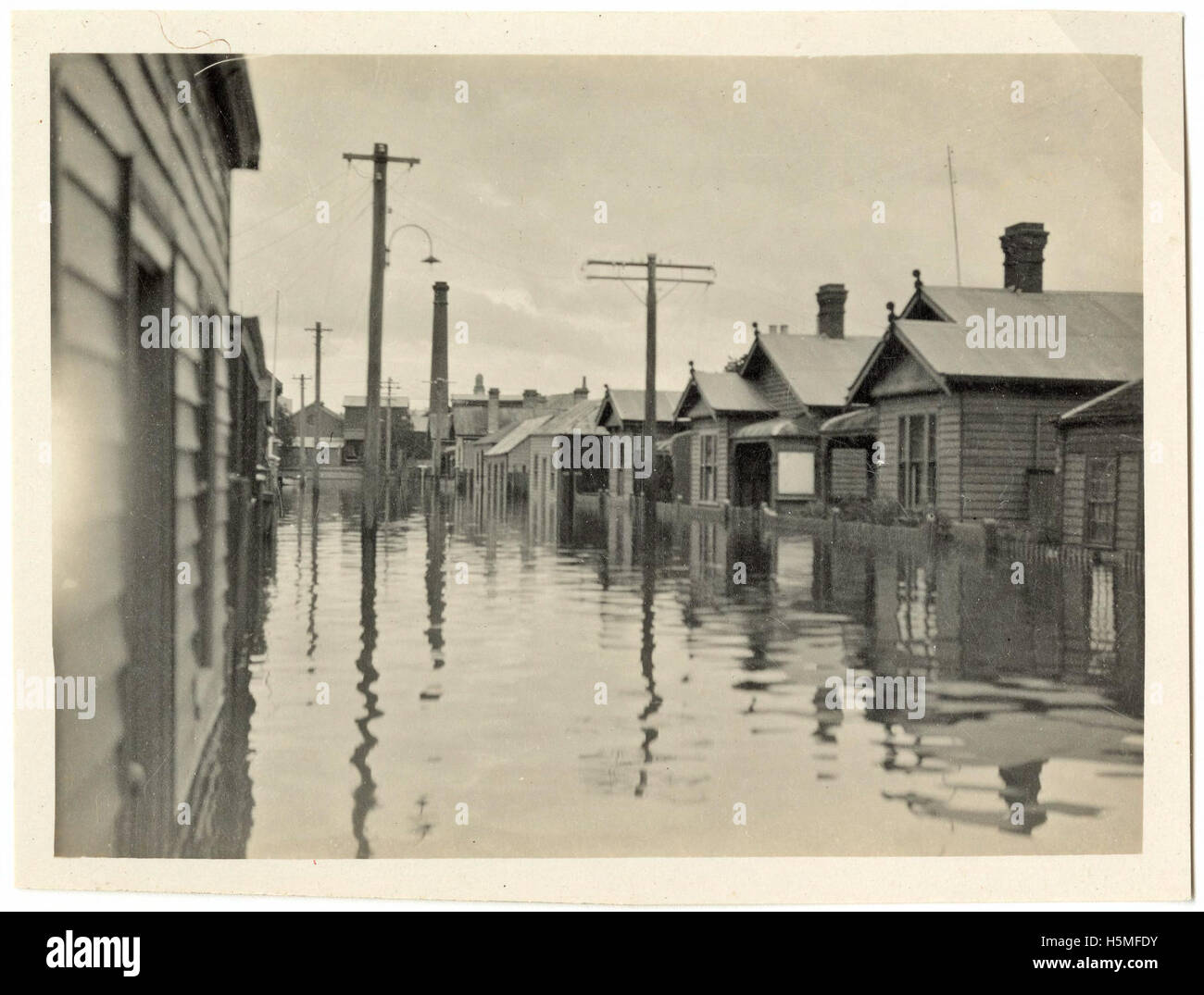 The flooded street and houses, possibly along Goodwin Street in ...