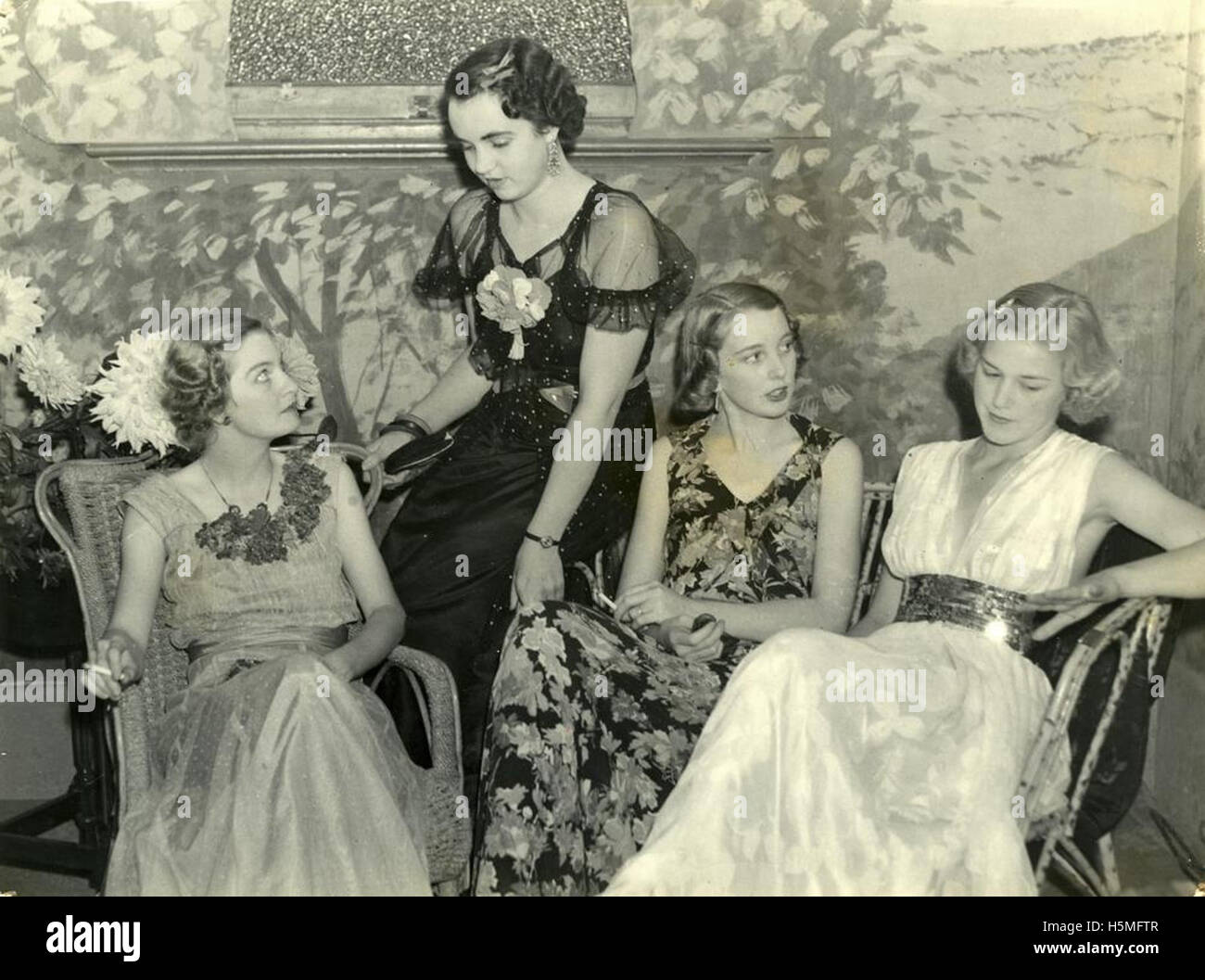 Young women at a military ball, March 1938 Stock Photo - Alamy