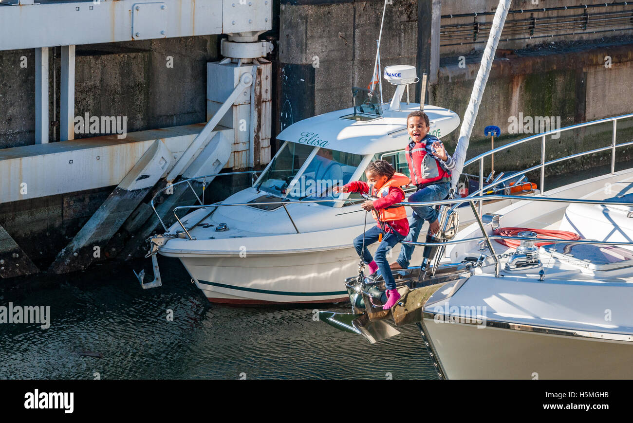 Kids on a boat Stock Photo - Alamy