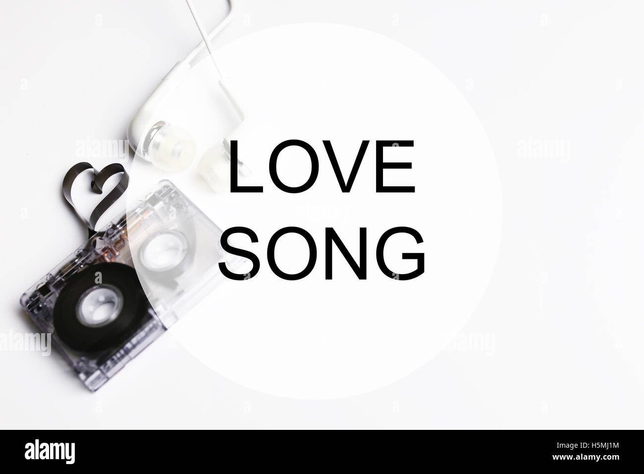love song background om audio cassette tape shape heart Stock Photo - Alamy