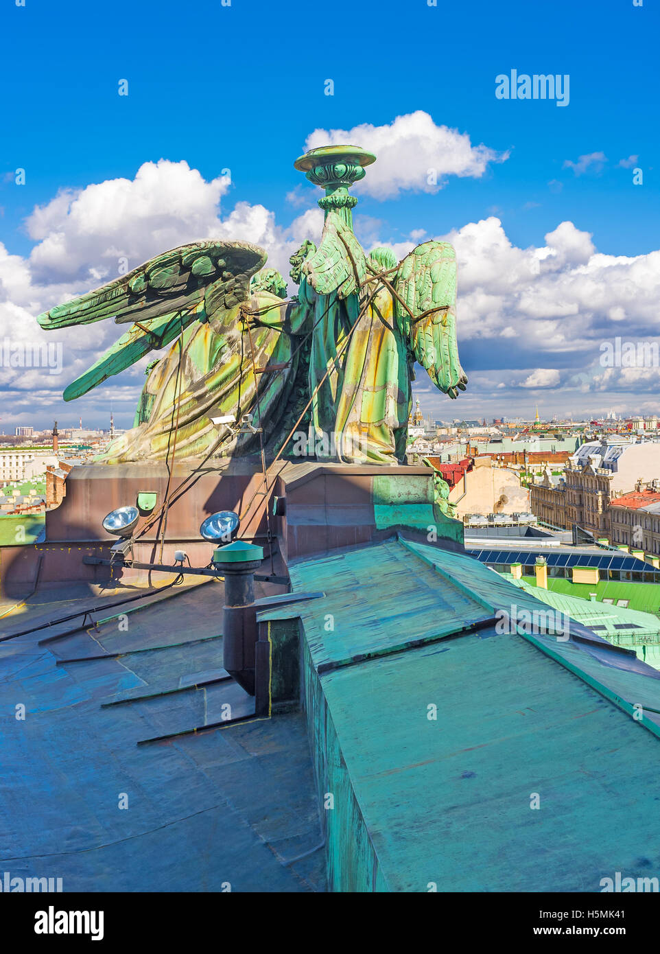 The bronze sculpture of angels, holding the torch, on the rooftop of ...