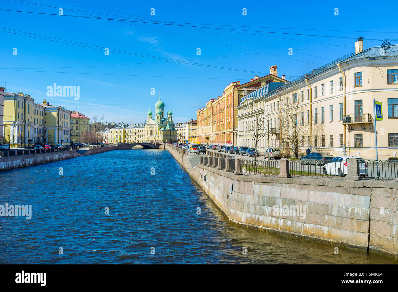 The bright blue waters of Griboedov Canal with the scenic mansions on ...