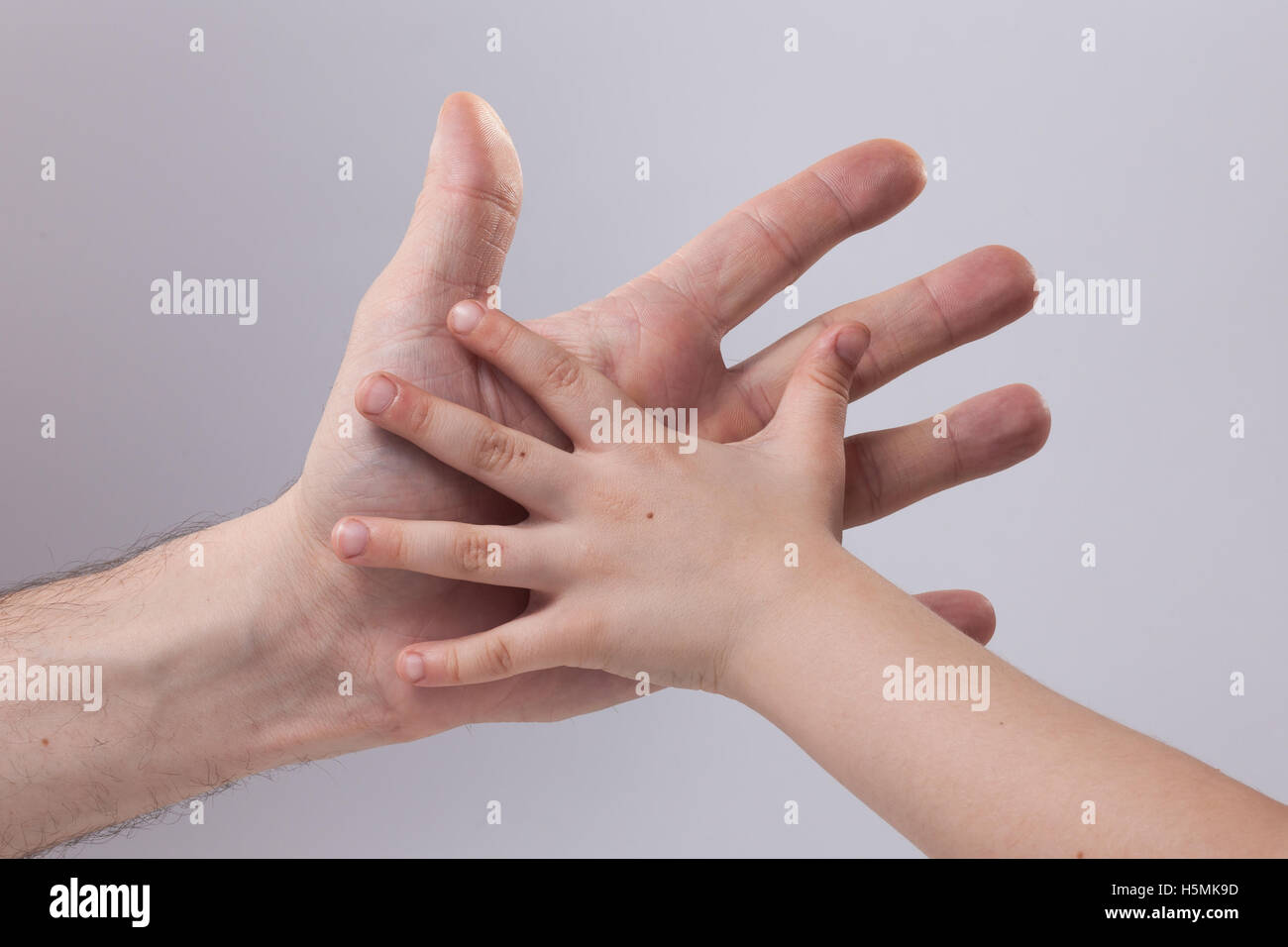 Child's hand adult hand hi-res stock photography and images - Alamy