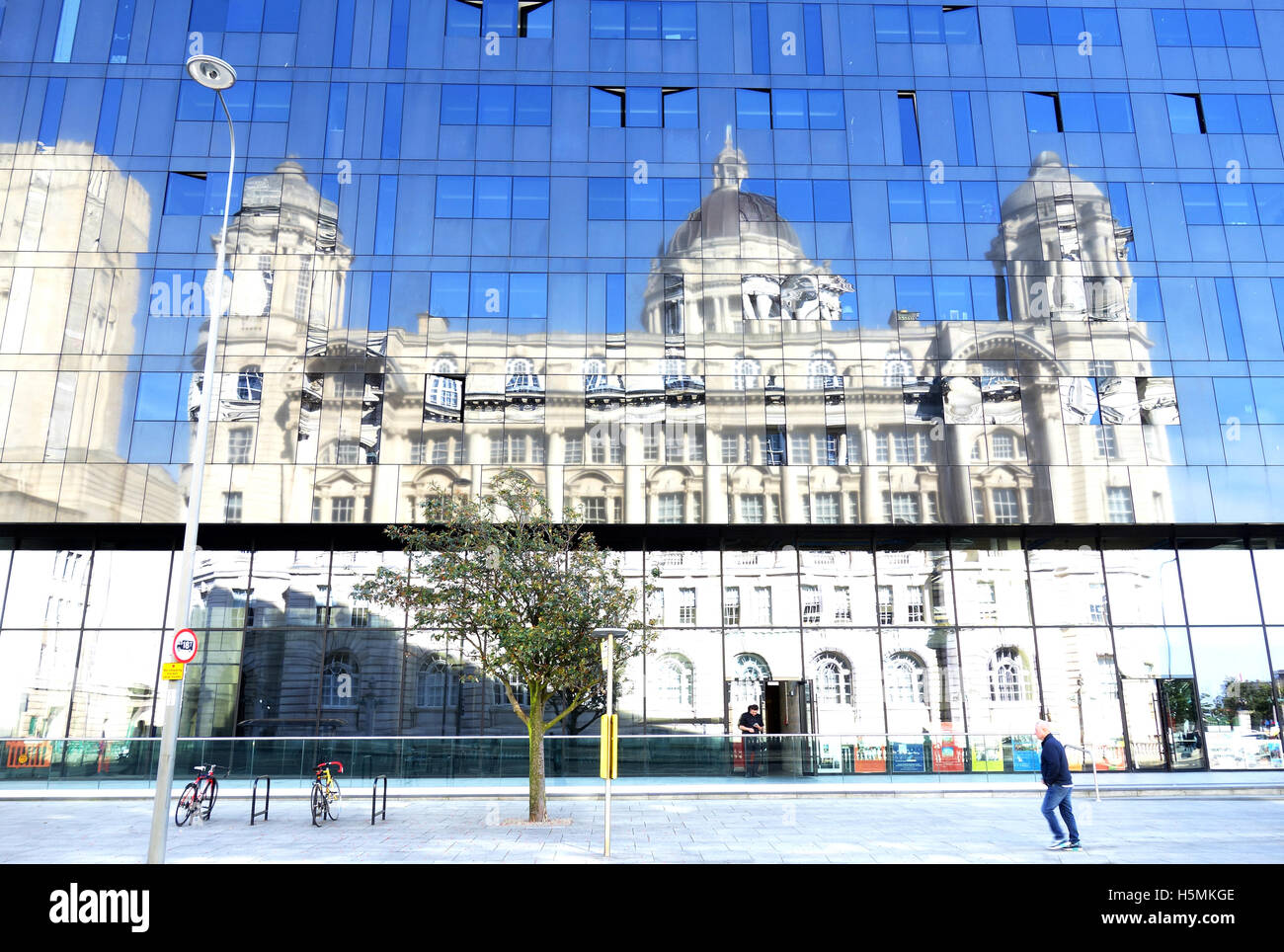 Reflection in glass of the port of liverpool building hi-res stock ...