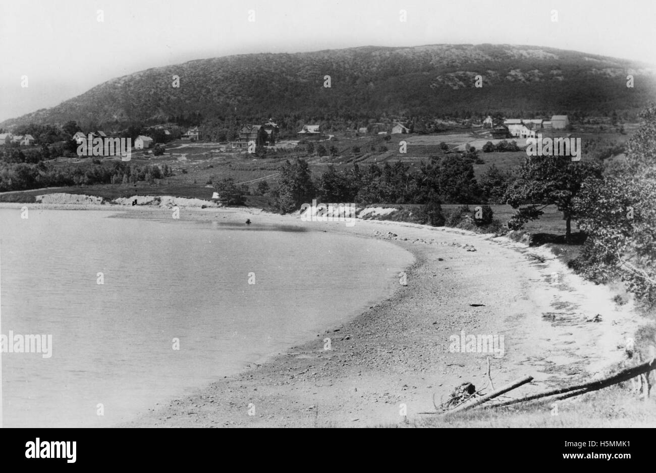 This photograph captures Camden Harbor in Maine, offering a scenic view ...