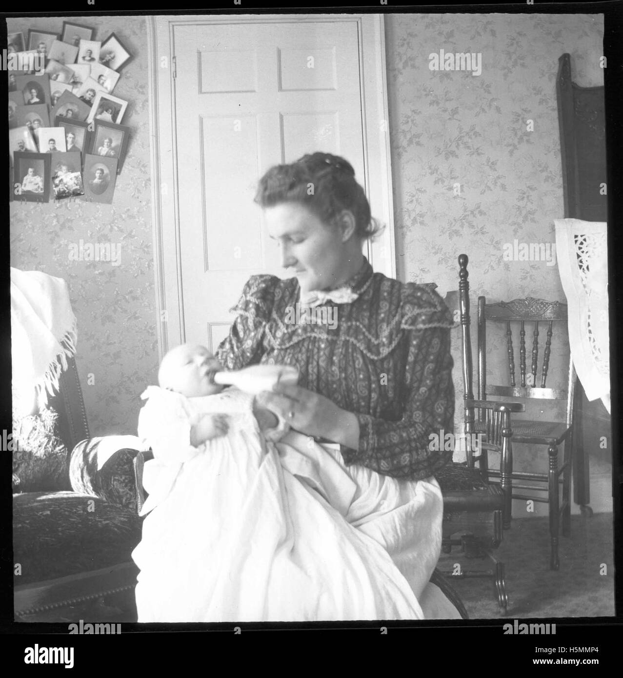 In this photograph from April 1900, Flora is shown with baby Norman in ...