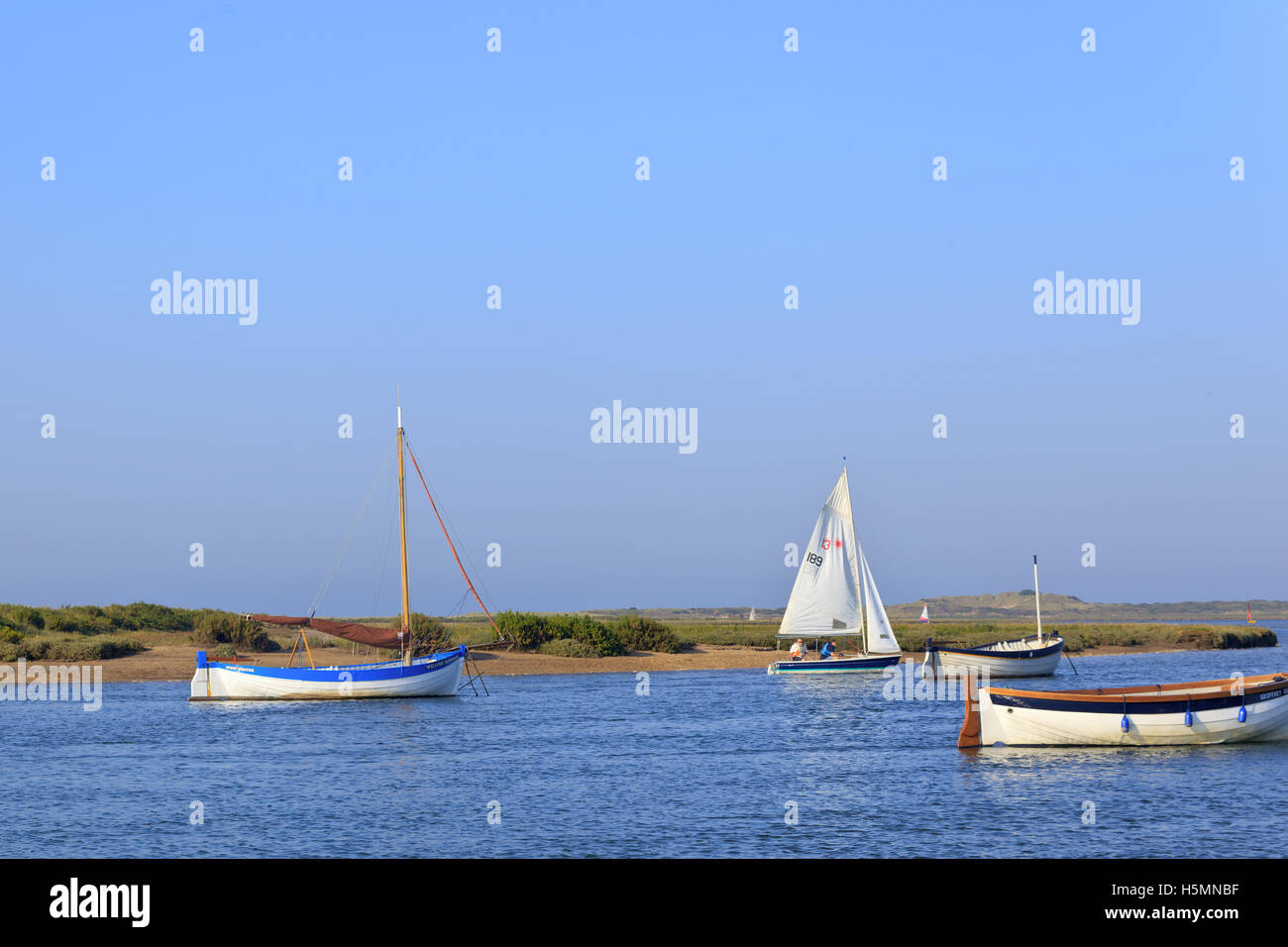 Boats on moorings on rising tide at Burnham-Overy-Staithe on the ...