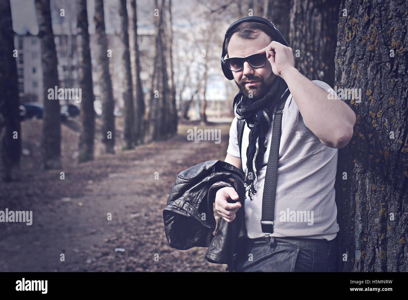 retro toned effected photo of alone man on street Stock Photo - Alamy