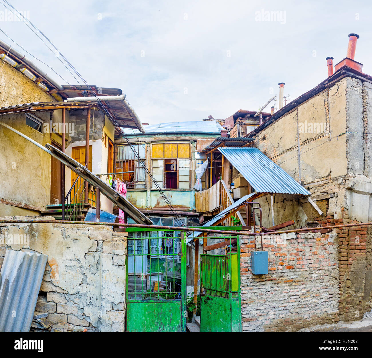 The slums occupy the large area in Tbilisi city center and consider as ...
