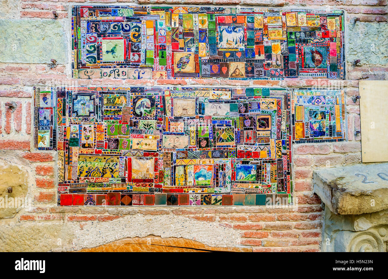 The tiny handpaint glazed tiles connected into the large mural on the ...