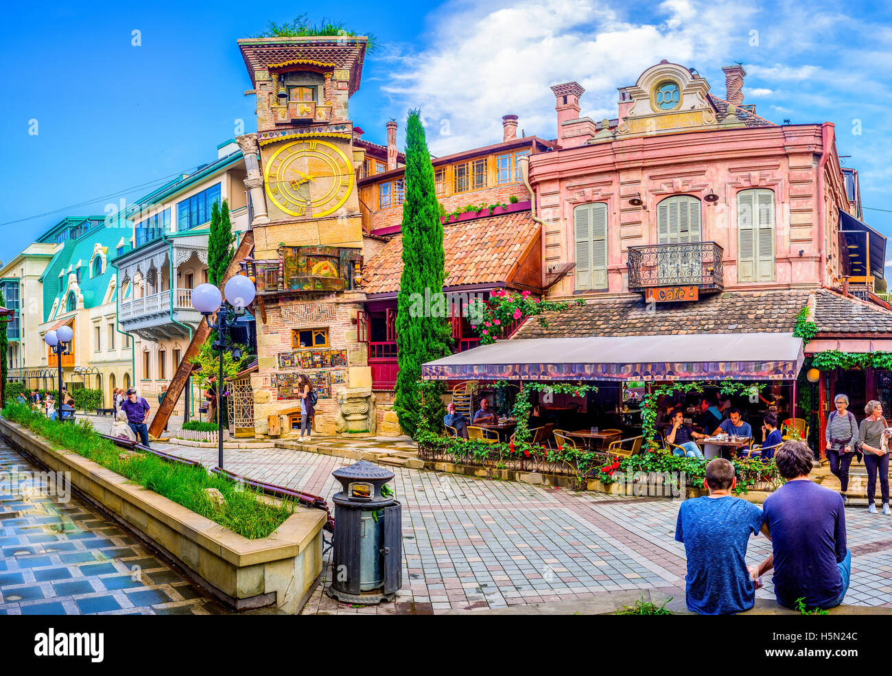 The leaning clock tower of Rezo Gabriadze Puppet Theatre with the art ...