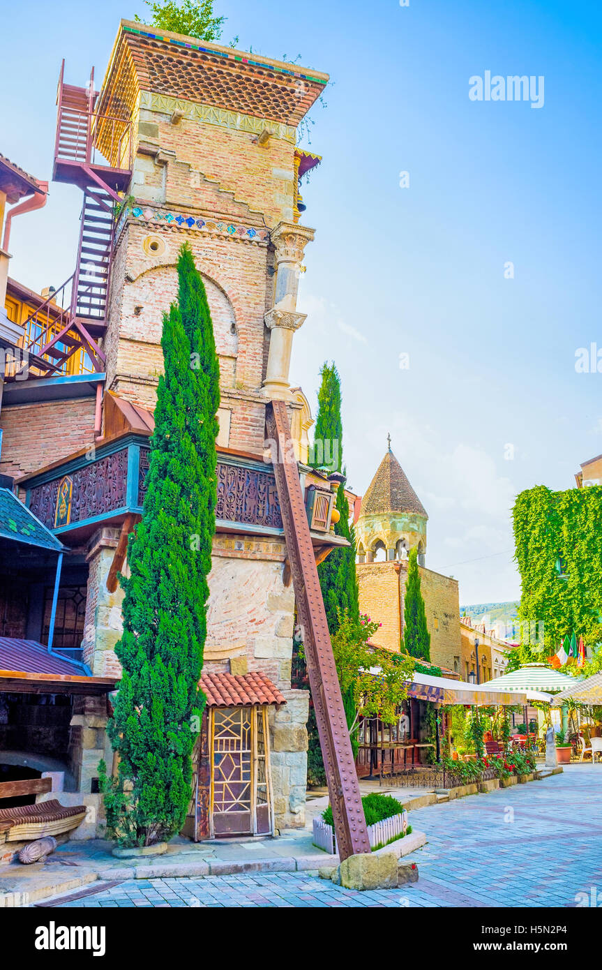 The Puppet Theatre leaning tower stands with the metal support, holding ...