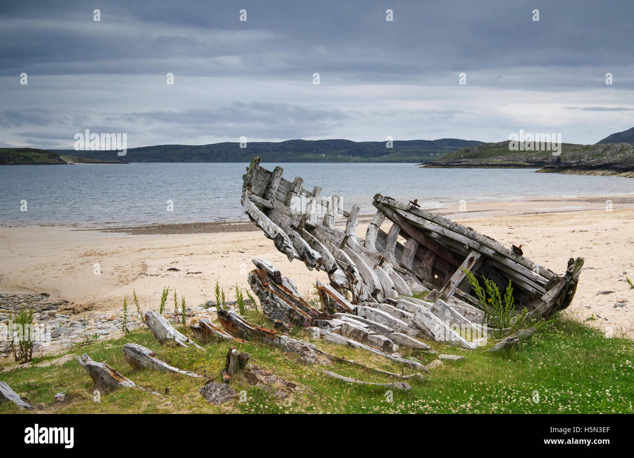 Wrecked fishing boat on the beach at Talmine Bay, Sutherland, Scotland ...