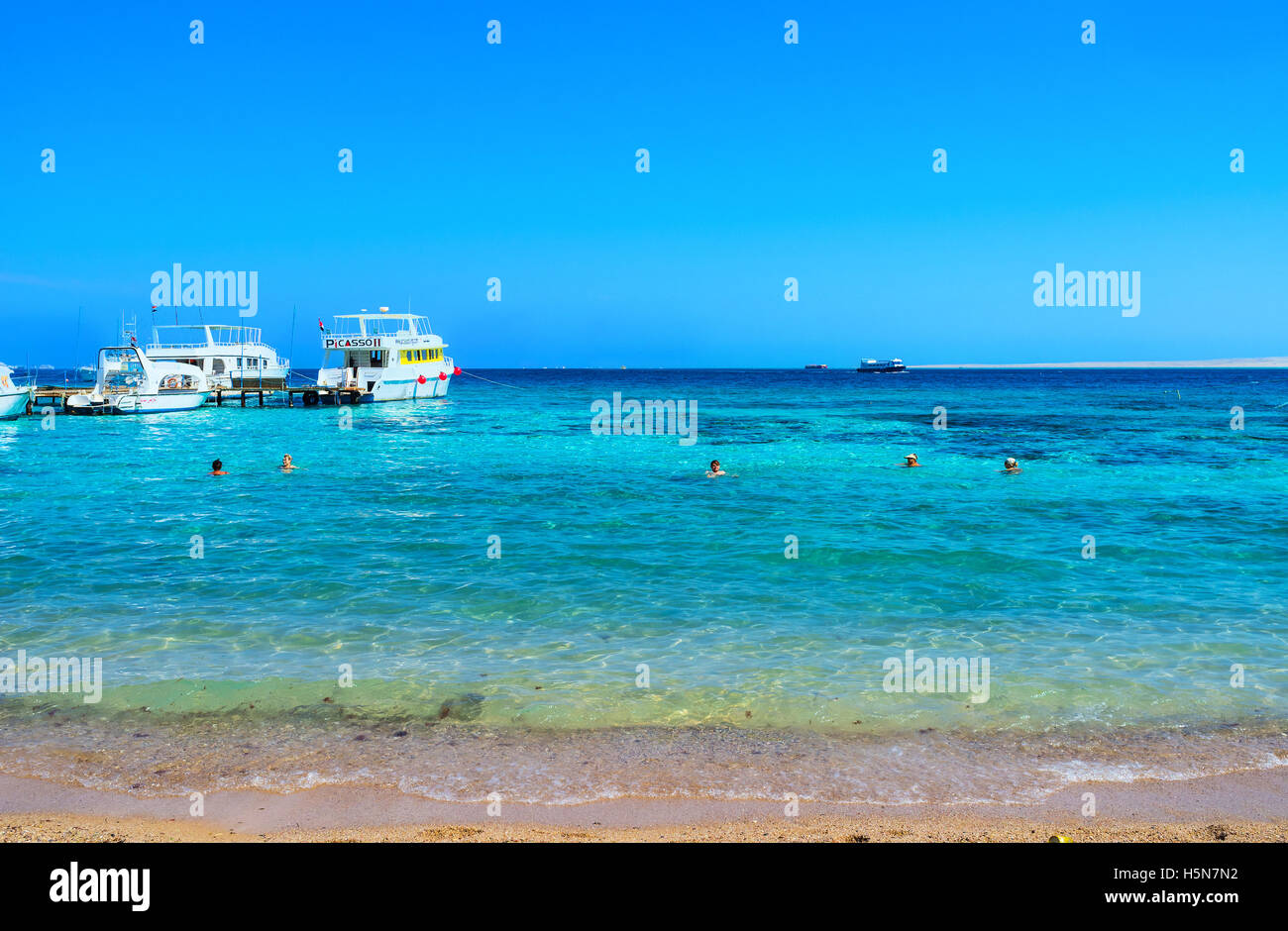 The bright blue sea of Hurghada waits the tourists to swim or to make a ...