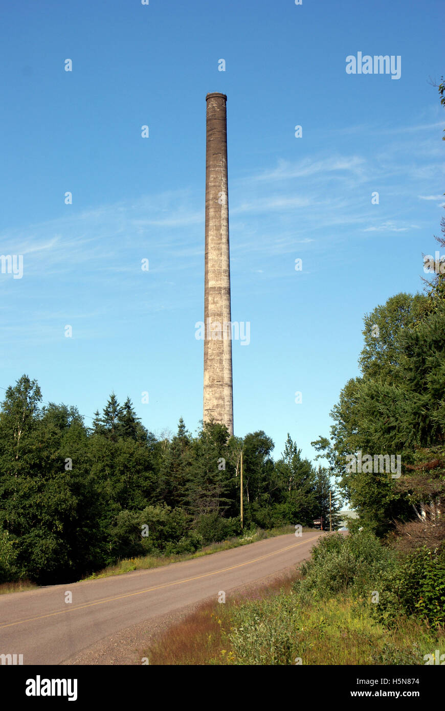 Tall factory or mill chimney hi-res stock photography and images - Alamy