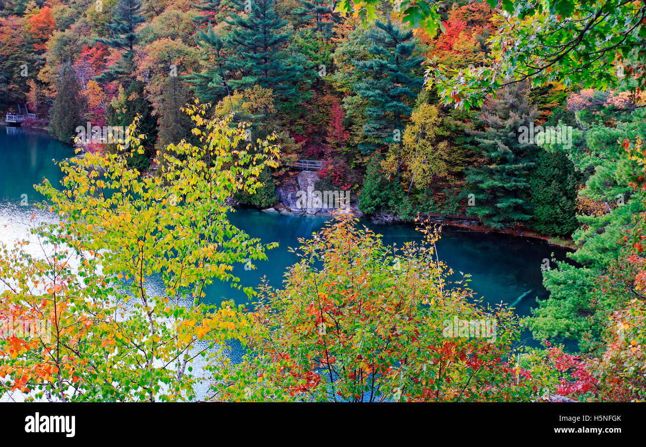 Fall colors around Pink Lake with tourists at various lookout spots on ...