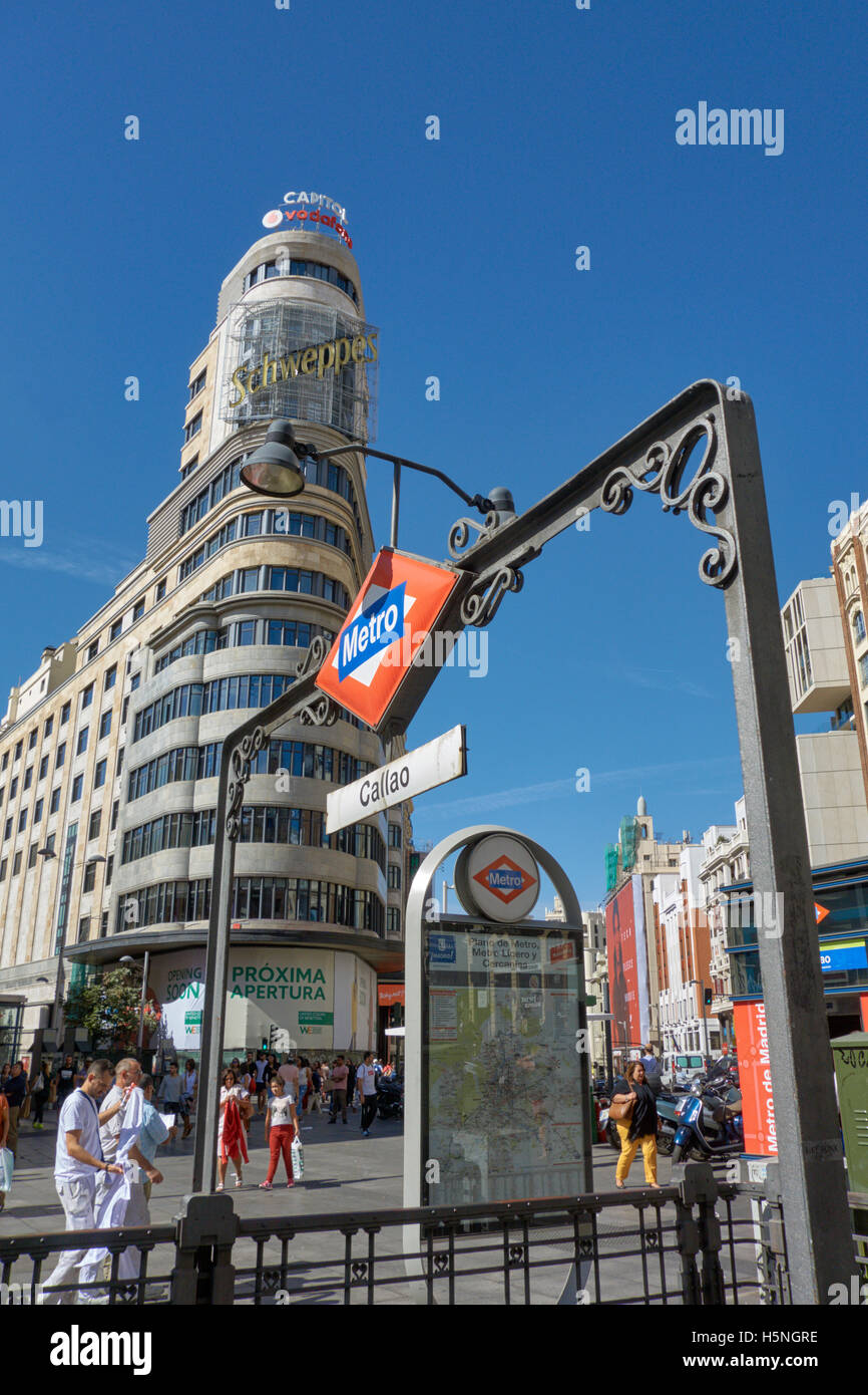 Callao Metro sign structure against blue sky with the iconic Schweppes ...
