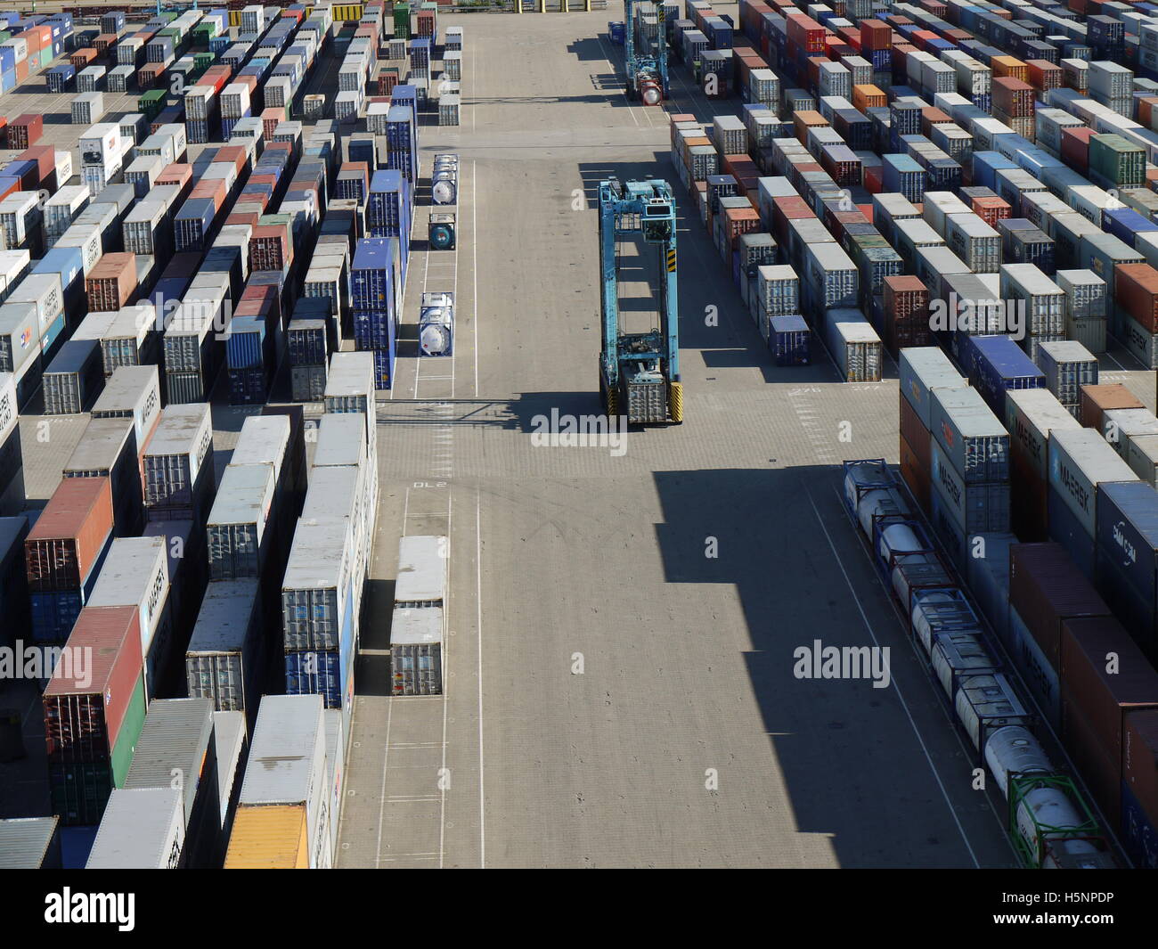 Containers waiting to be loaded on the dock of the Port of Rotterdam ...
