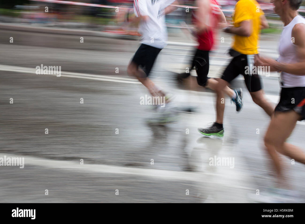 A marathon run, legs and people in motion Stock Photo - Alamy