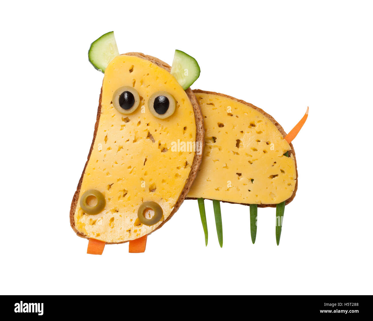 Hippo made of cheese and bread on white background Stock Photo - Alamy