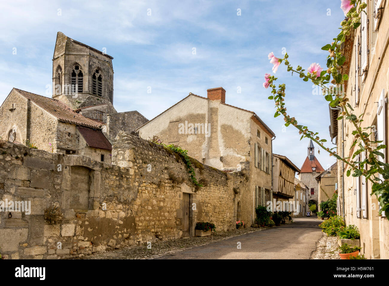 Church St Jean Baptiste and street of Charroux, labelled as one of the ...