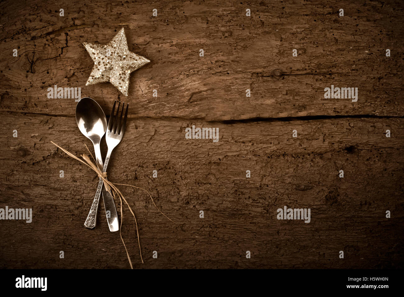 Christmas day dinner with table setting star in rustic wood style with ...
