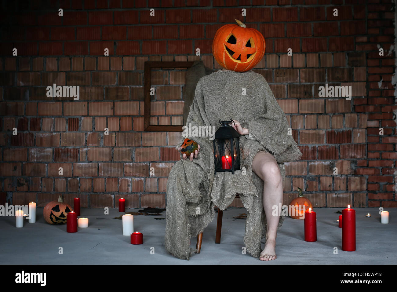 pumpkin head monster horror indoor Stock Photo - Alamy