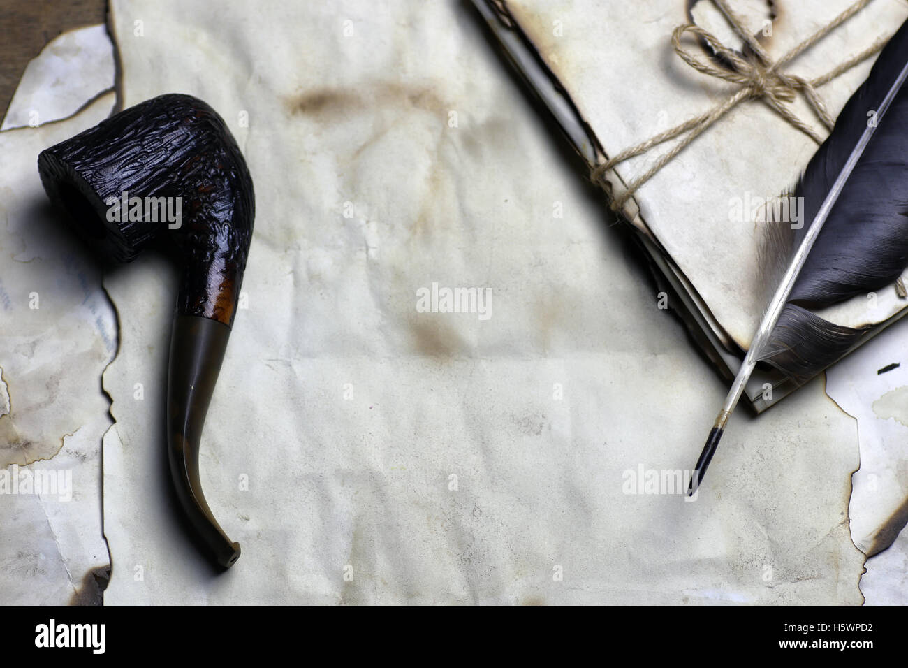 old paper letter feather Stock Photo - Alamy