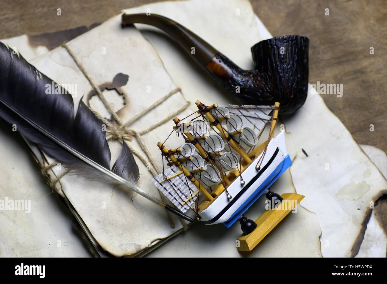 old paper letter feather Stock Photo - Alamy