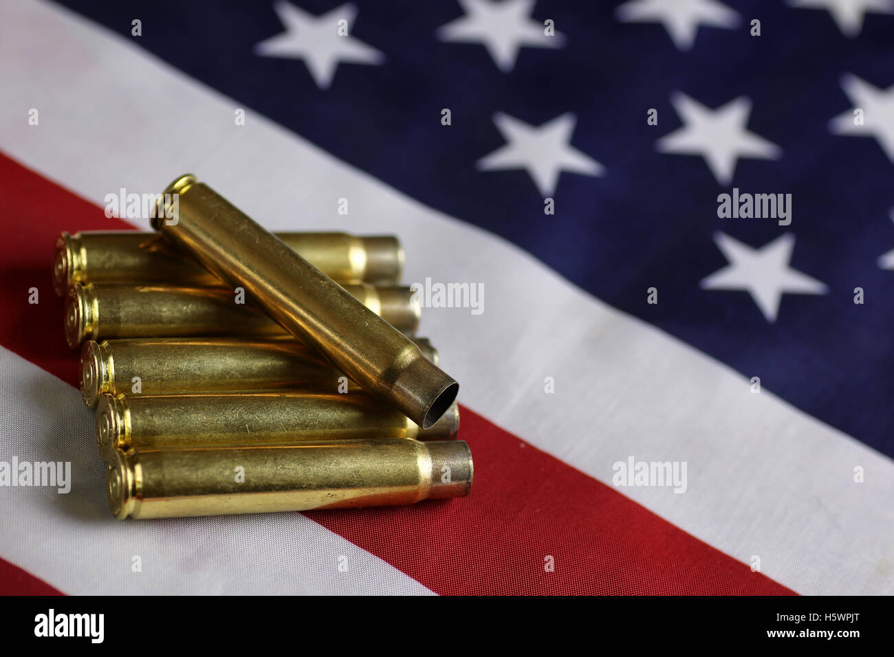 bullet on the USA flag Stock Photo - Alamy