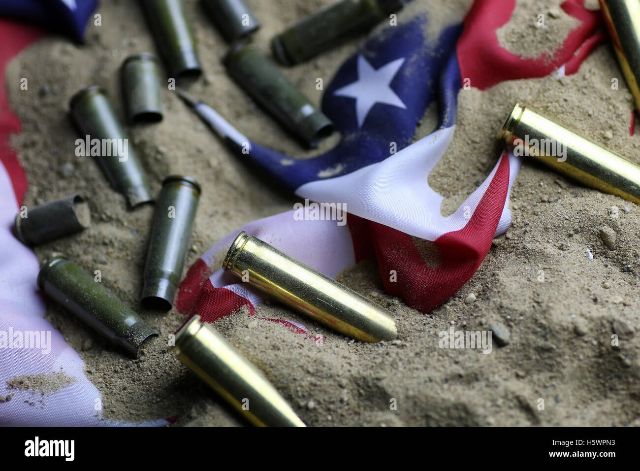 bullet and usa flag in the sand war Stock Photo - Alamy