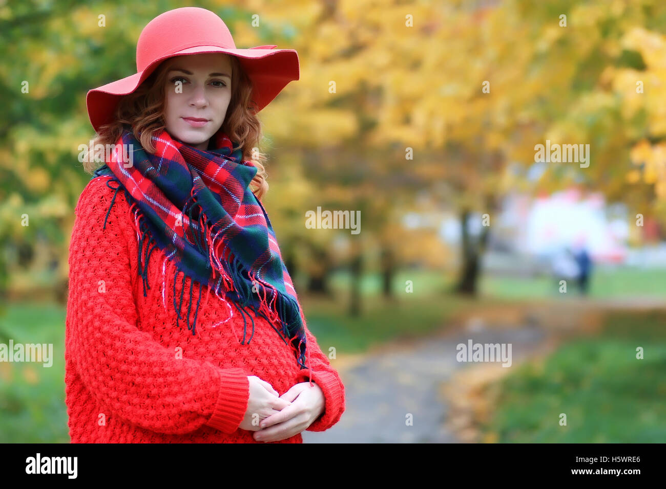 woman in red hat autumn outdoor Stock Photo - Alamy