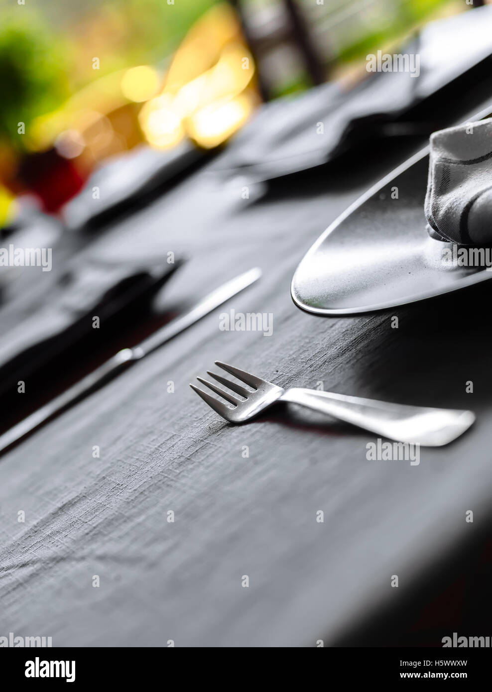 Elegant table set for dinner Stock Photo - Alamy