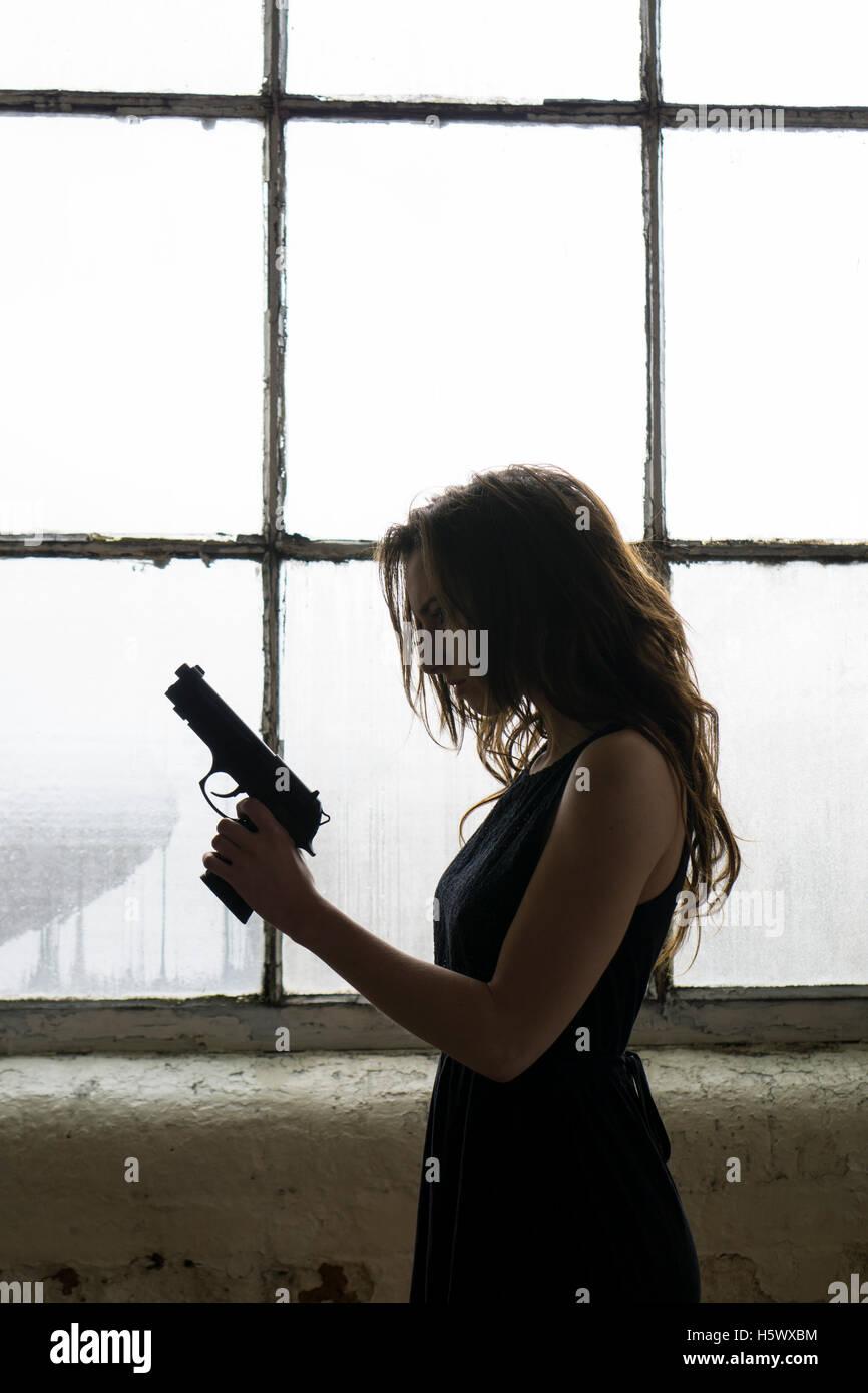 Woman Holding Gun Her Hand High Resolution Stock Photography and Images ...