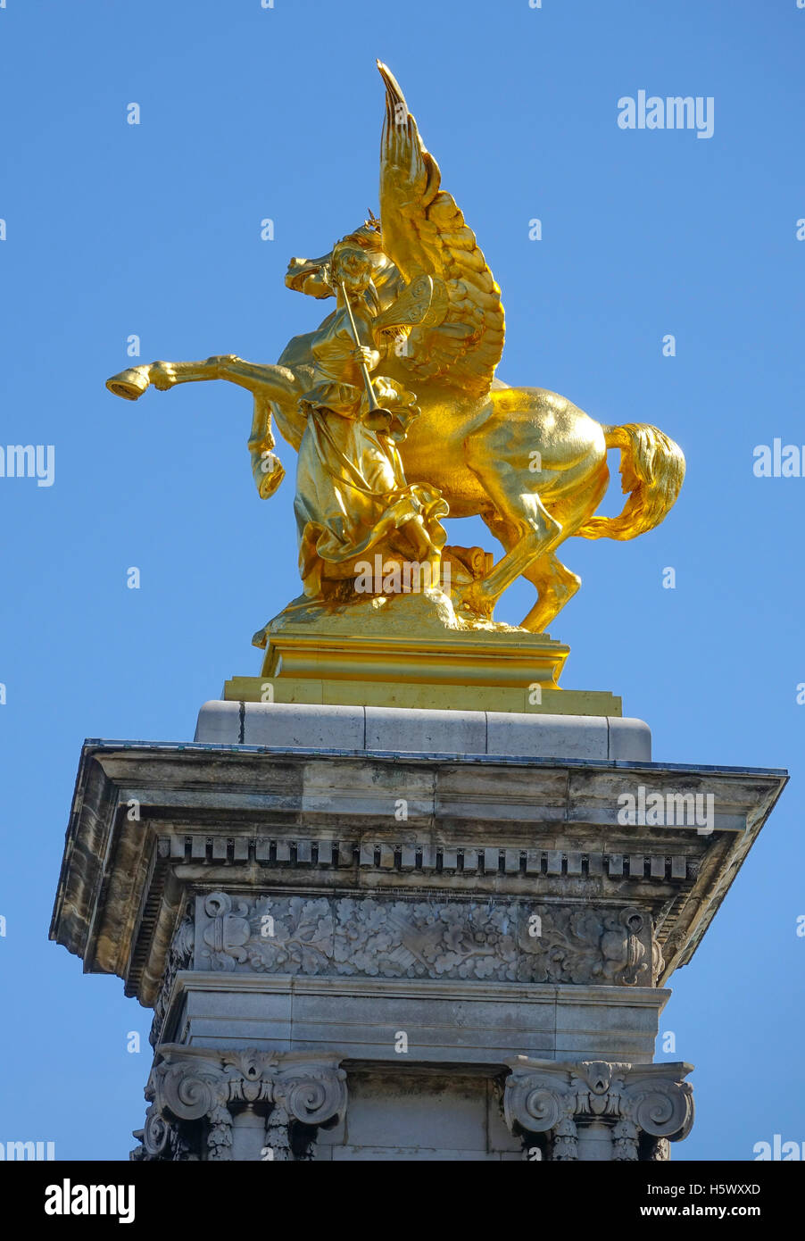 The golden statues on Alexandre III bridge in Paris Stock Photo - Alamy