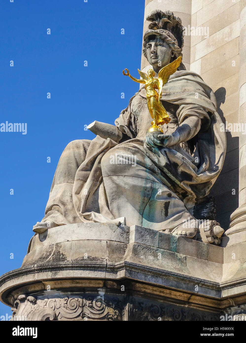 Impressive statues on Alexandre III Bridge in Paris Stock Photo - Alamy