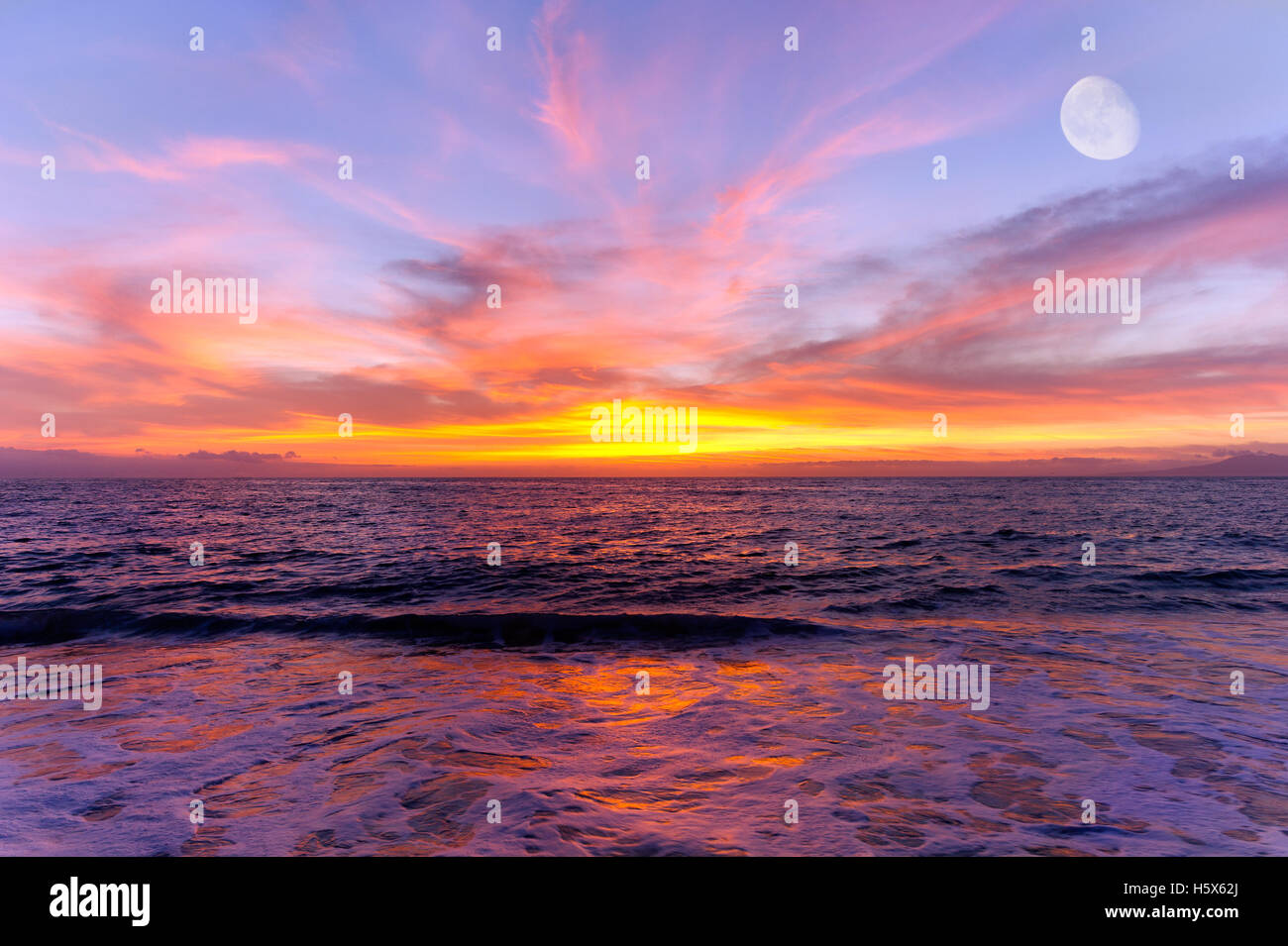 Sunset ocean moon is a colorful scenic ocean sunset setting with the ...