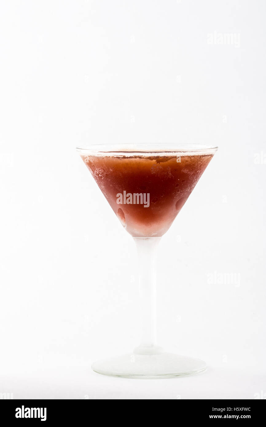 brown alcohol cocktail in martini glass Stock Photo - Alamy