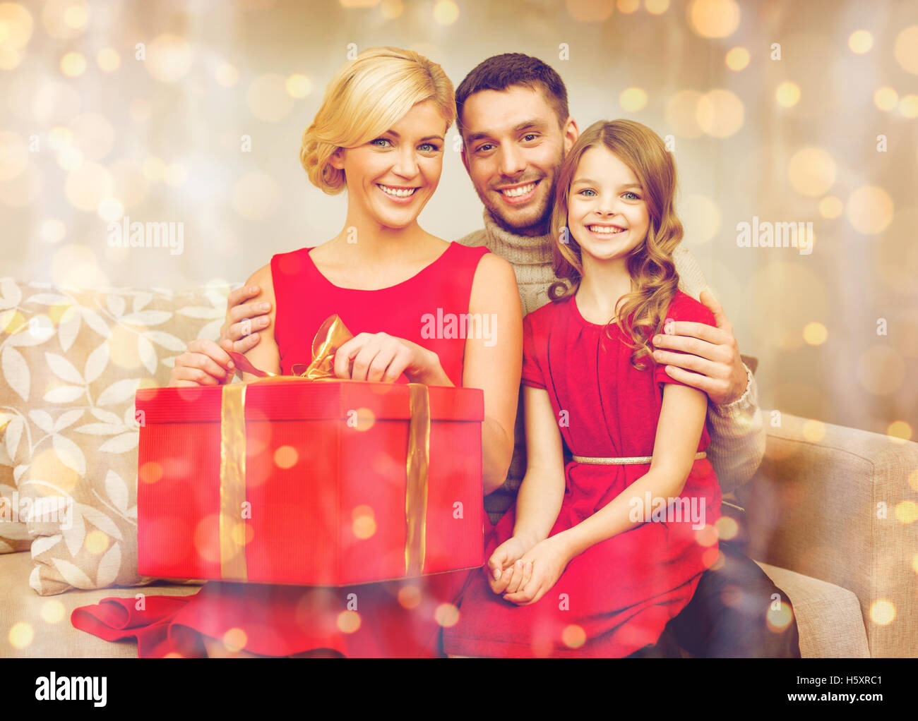 happy family opening gift box Stock Photo - Alamy