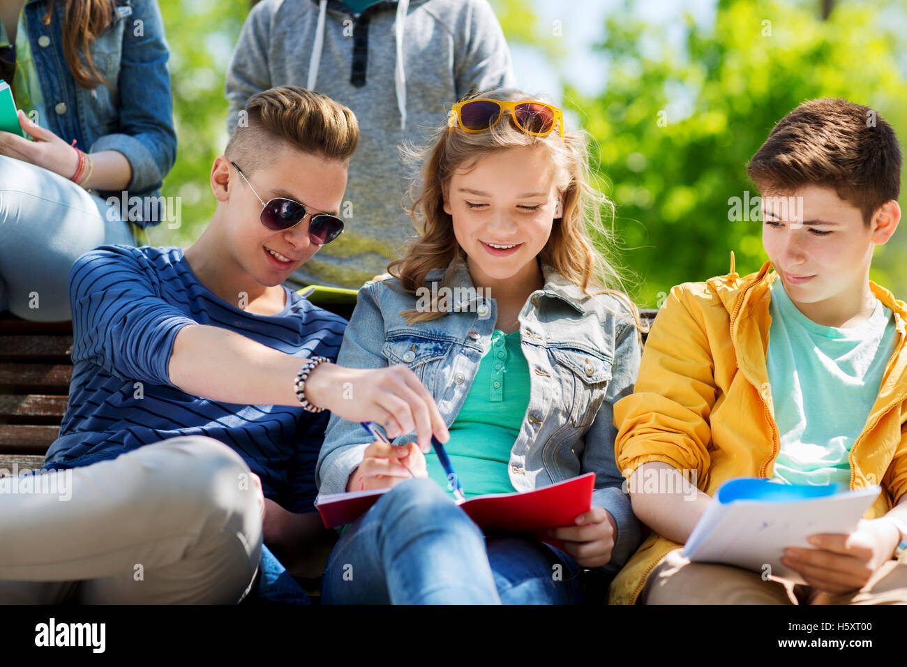 group of students with notebooks at school yard Stock Photo - Alamy