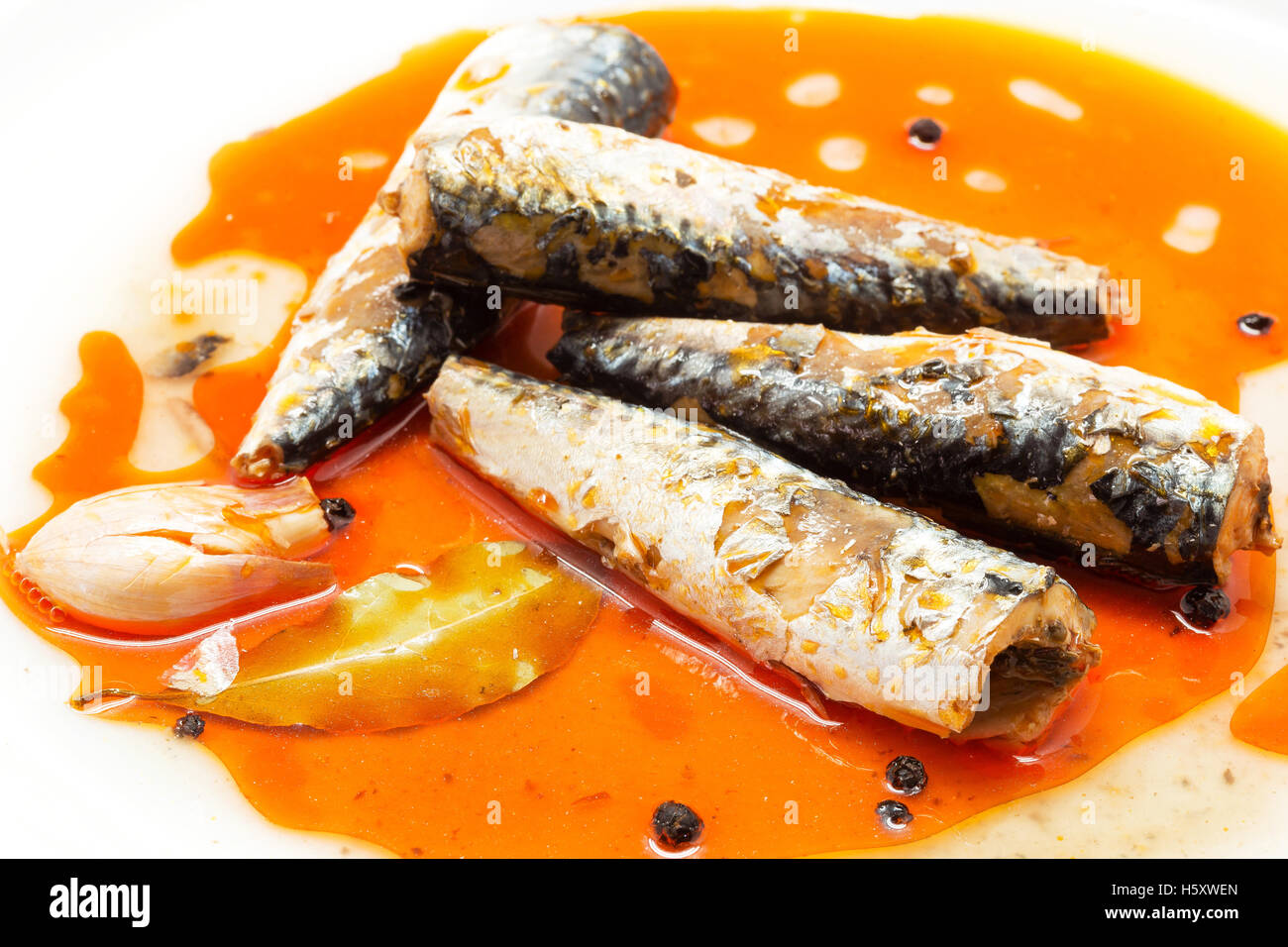Marinated mackerel in tomato souce Stock Photo - Alamy