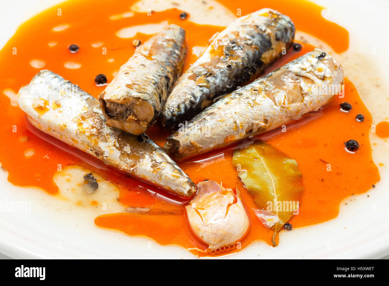 Marinated mackerel in tomato souce Stock Photo - Alamy