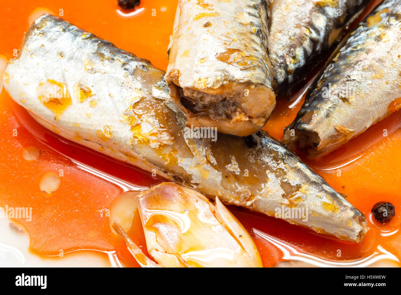 Marinated mackerel in tomato souce Stock Photo - Alamy