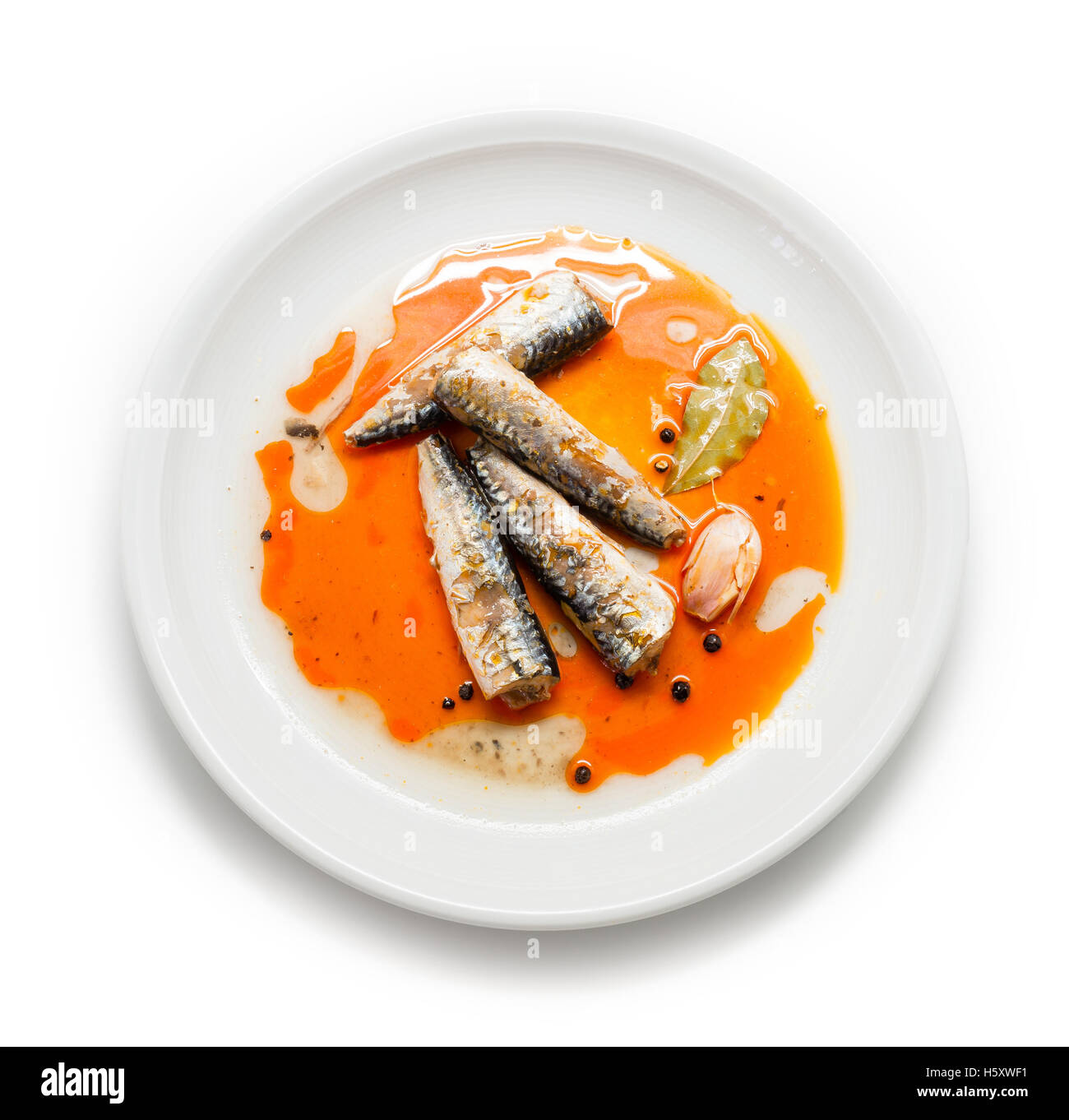 Marinated mackerel in tomato souce Stock Photo - Alamy