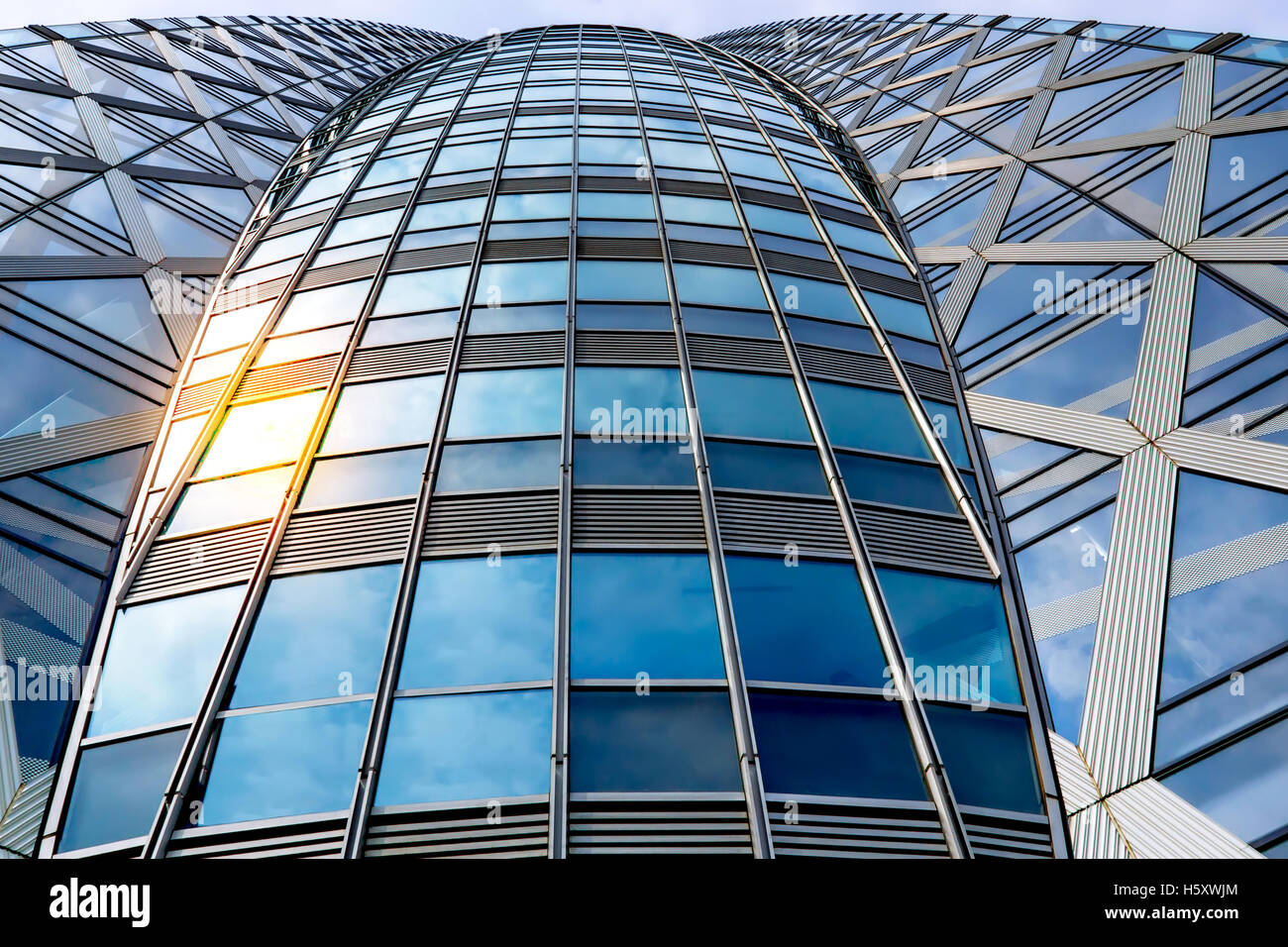 Exterior of contemporary glass business center Stock Photo - Alamy