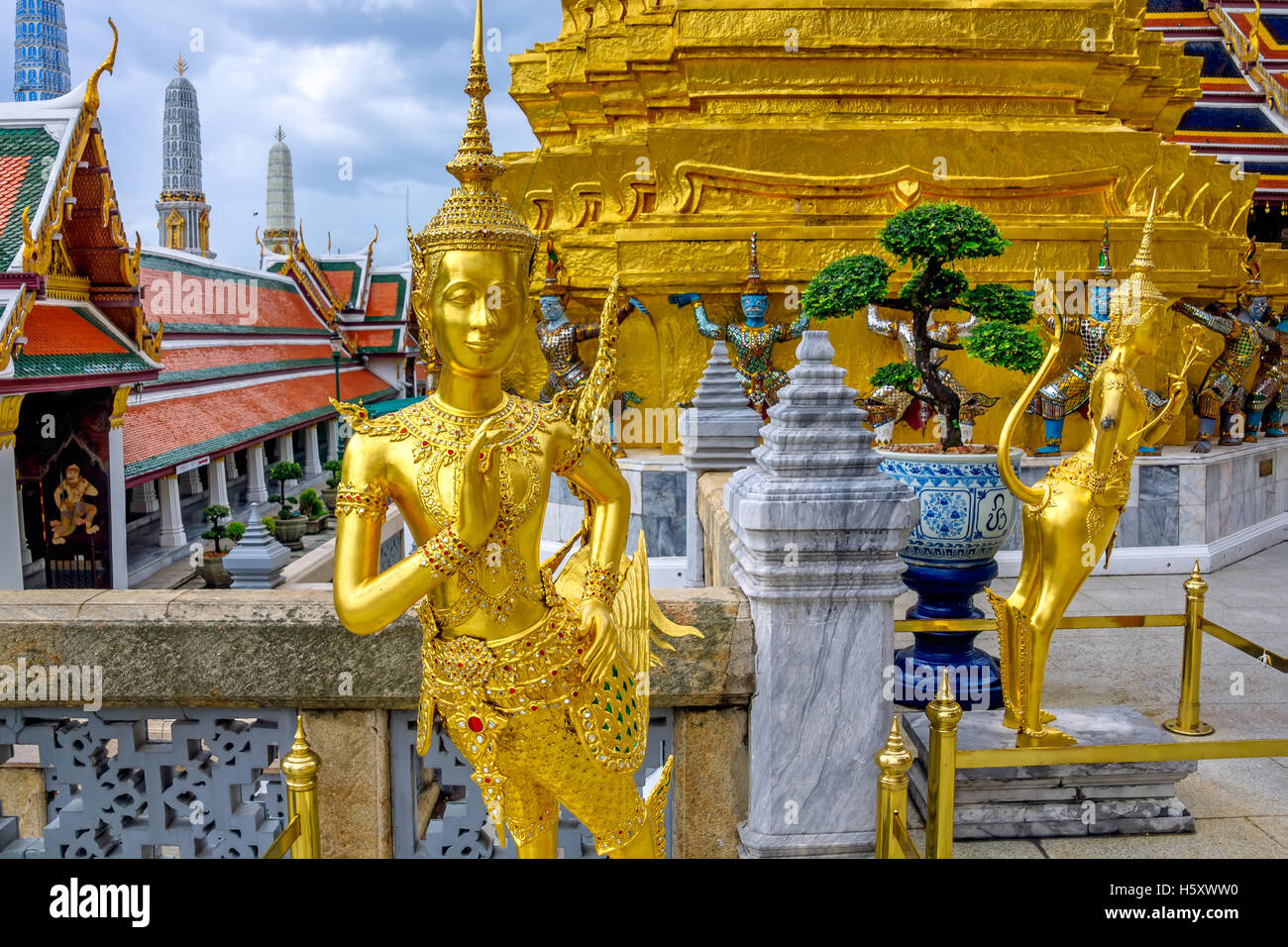 Golden kinnari statue hi-res stock photography and images - Alamy